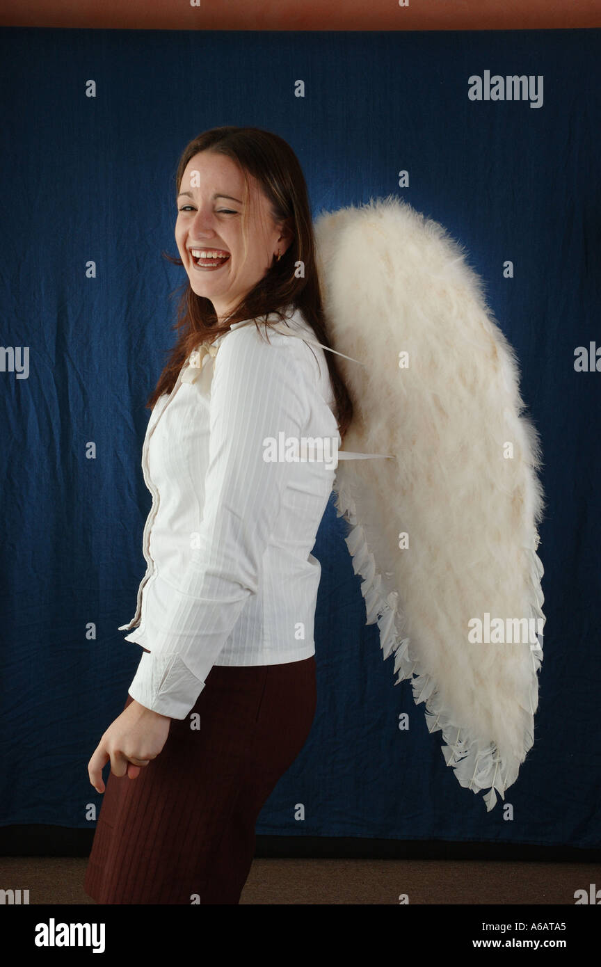 young woman poses as an angel in studio dsca 2111 Stock Photo - Alamy