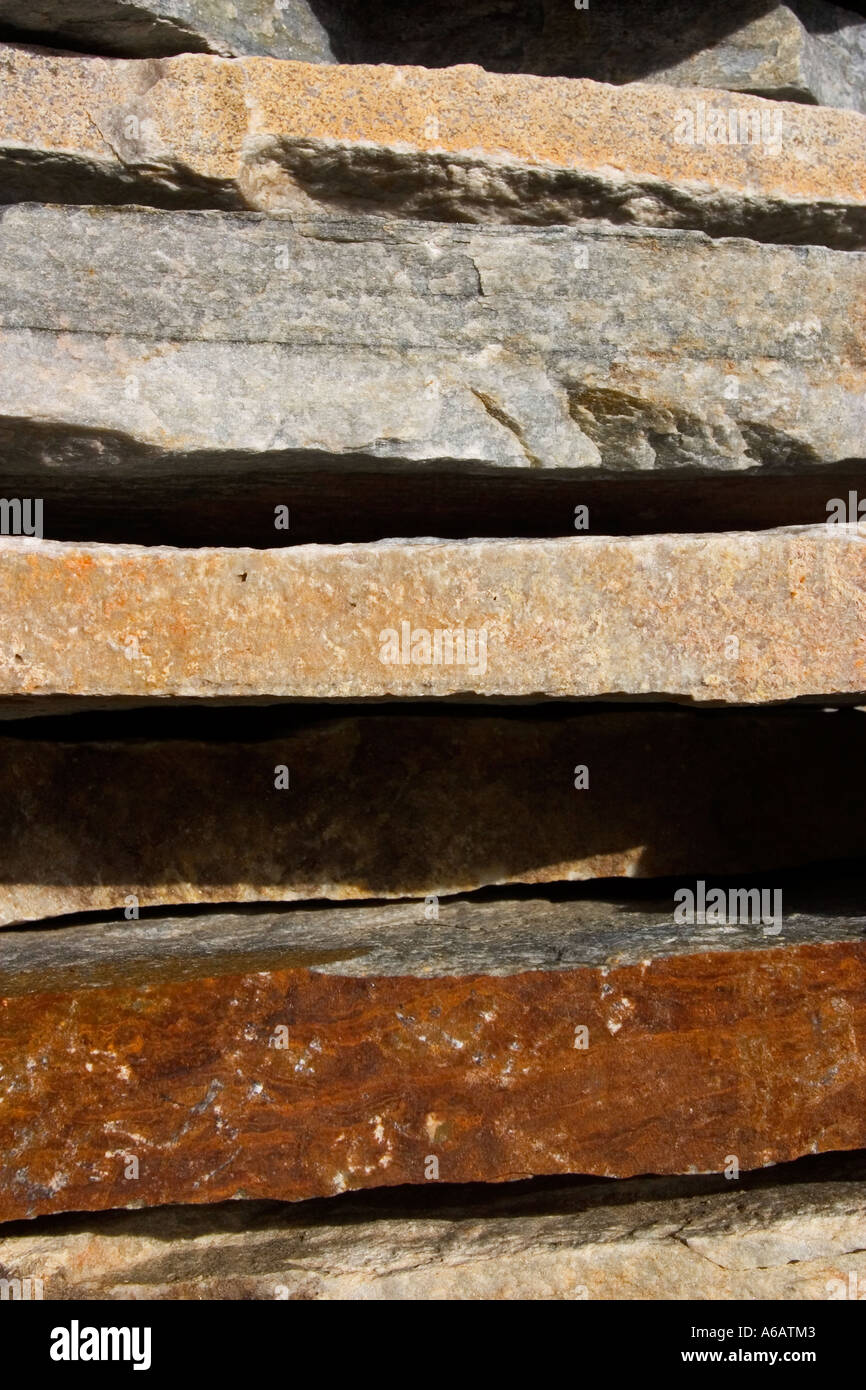 edge view of stacked, reclaimed architectural stone Stock Photo - Alamy