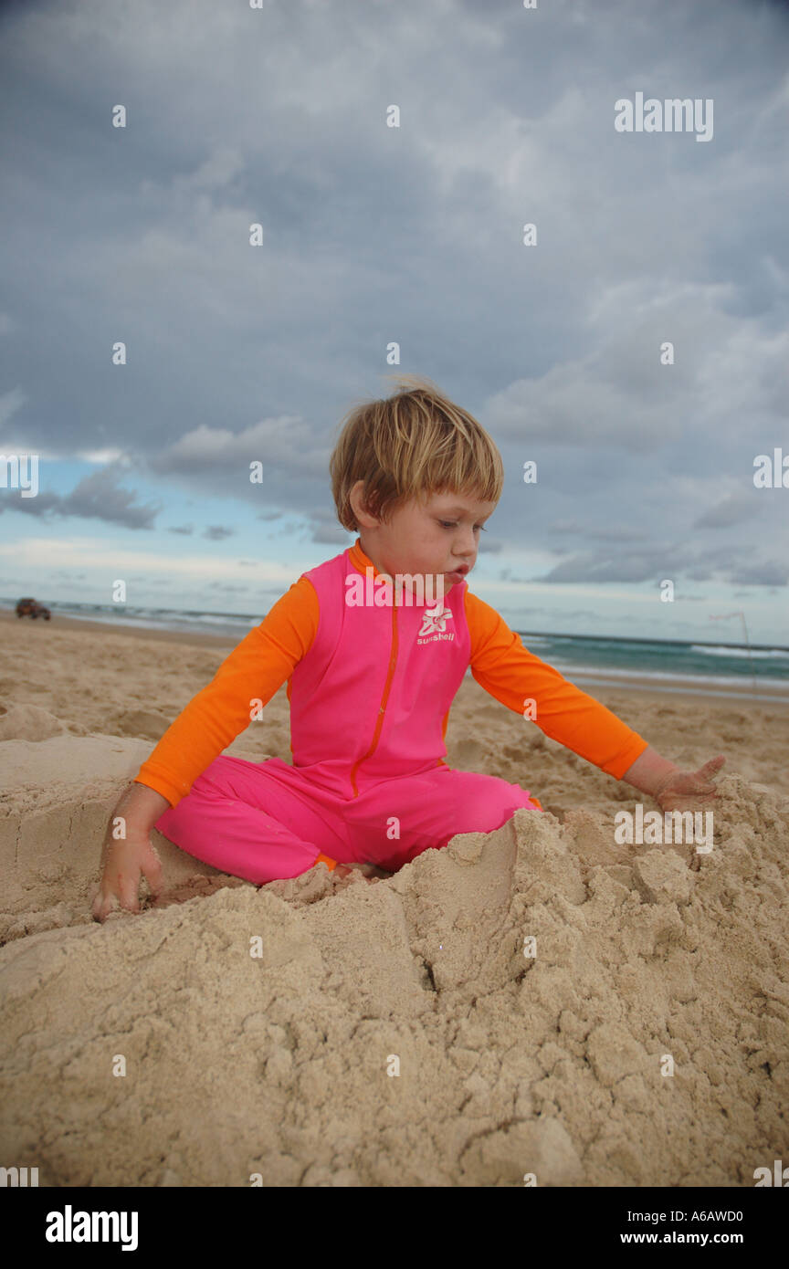 young glirl plays on beach Noosa Queensland sun smart suit dsca 1714 ...