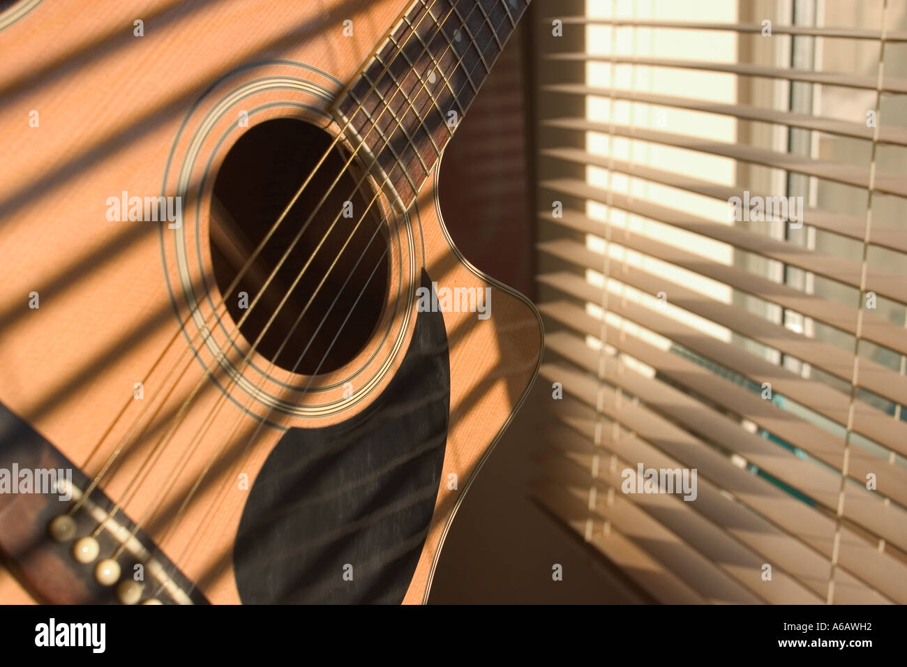 shadows on guitar Stock Photo - Alamy