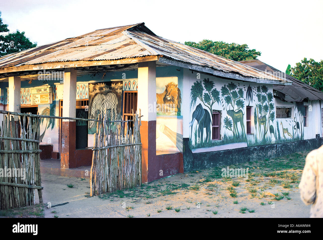 Small shop or DUKA decorated with paintings of animals and trees ...