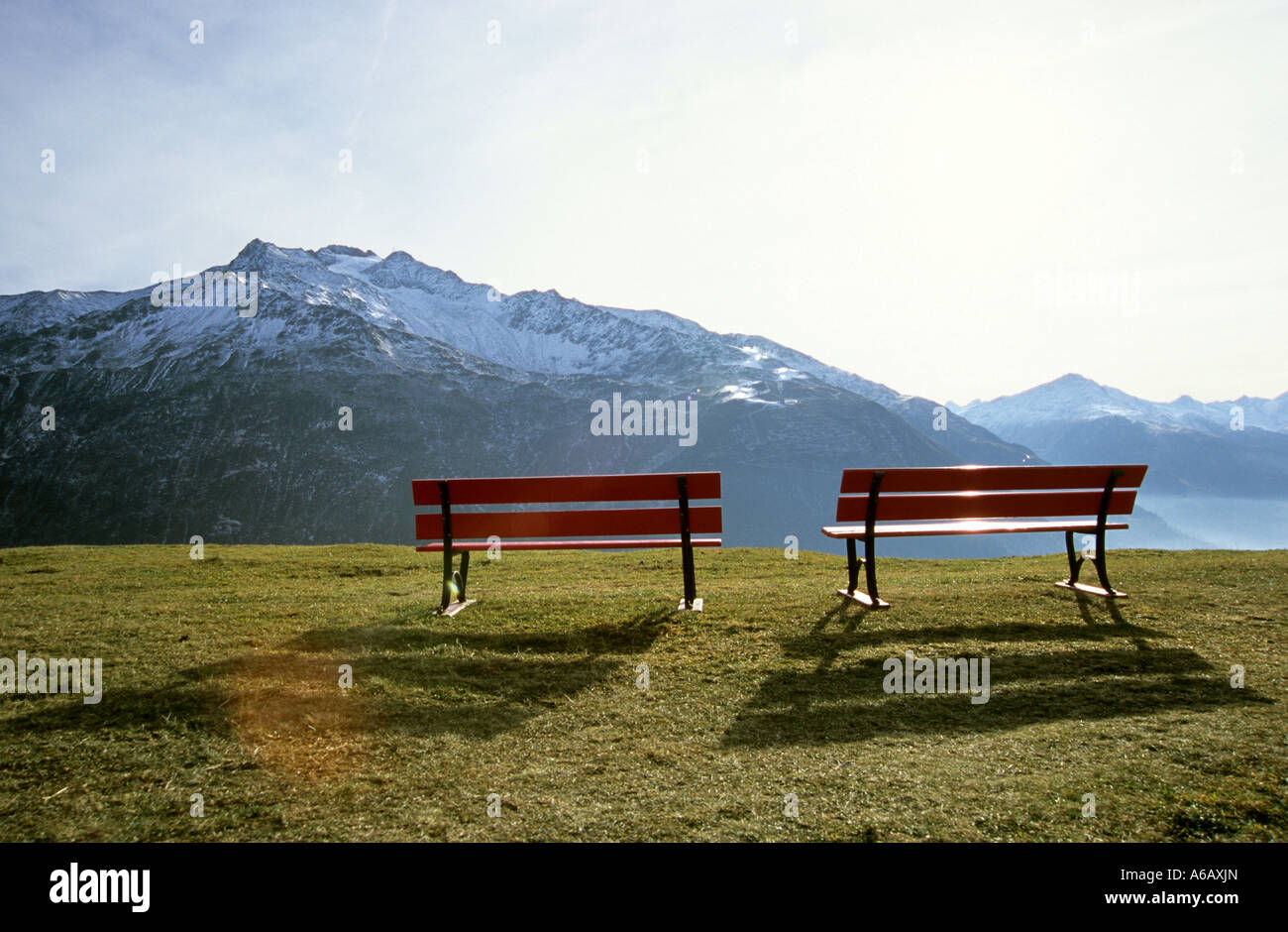 Benches and mountain panorama, Switzerland Stock Photo - Alamy