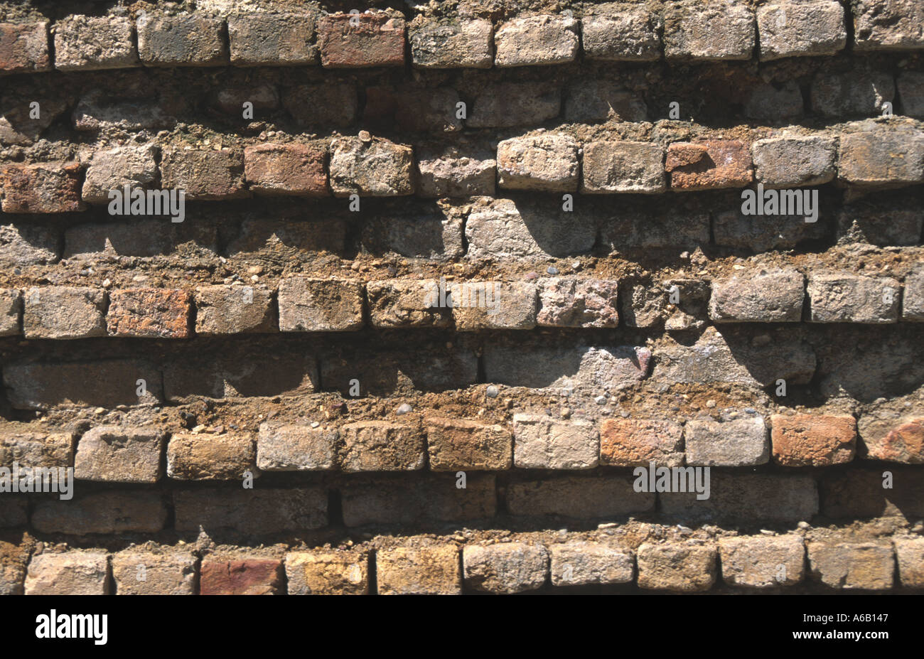 wall old bricks red brown erosion weathering Stock Photo - Alamy