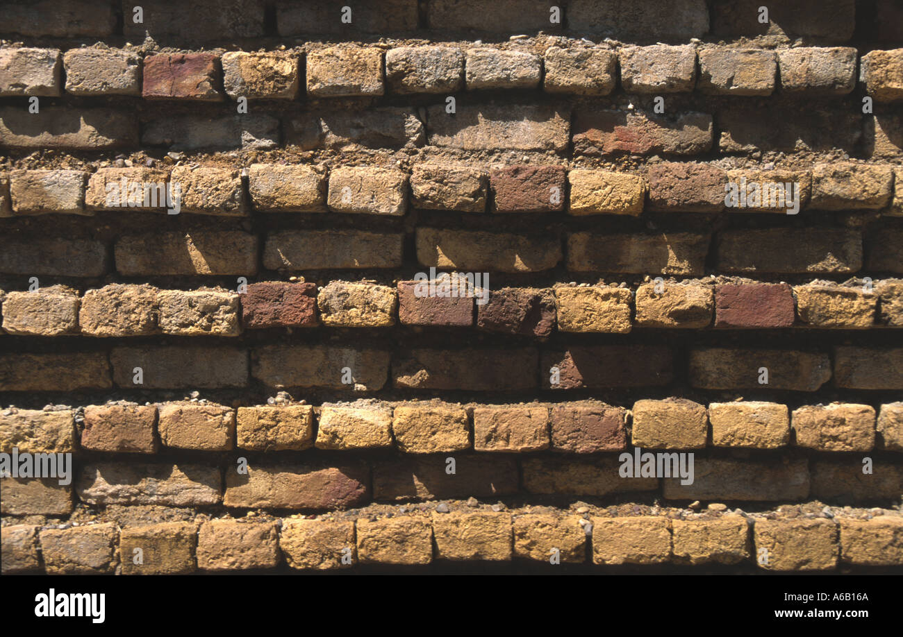 wall old bricks red brown erosion weathering Stock Photo - Alamy