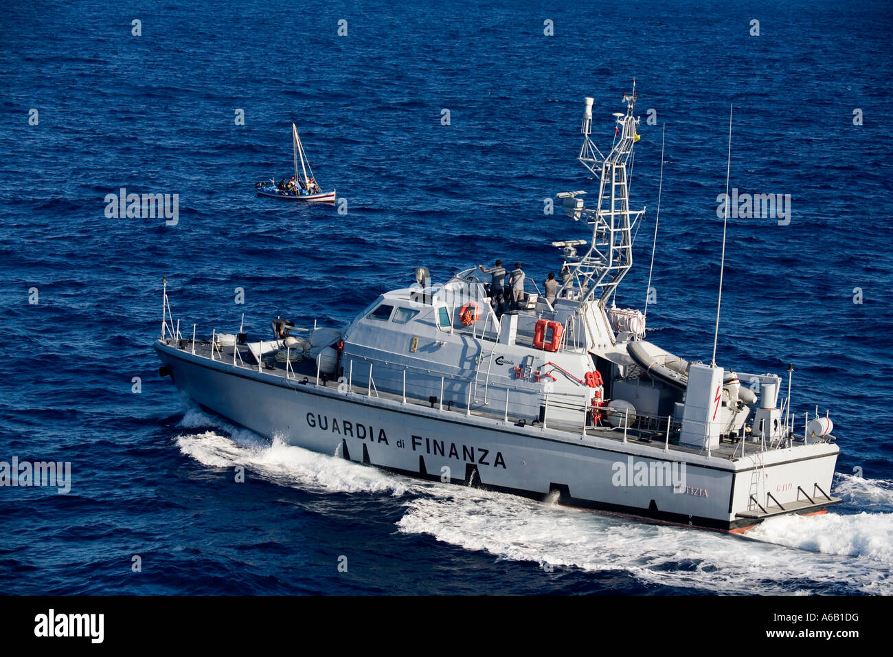 Italian custom police rescue operation in open sea Stock Photo - Alamy