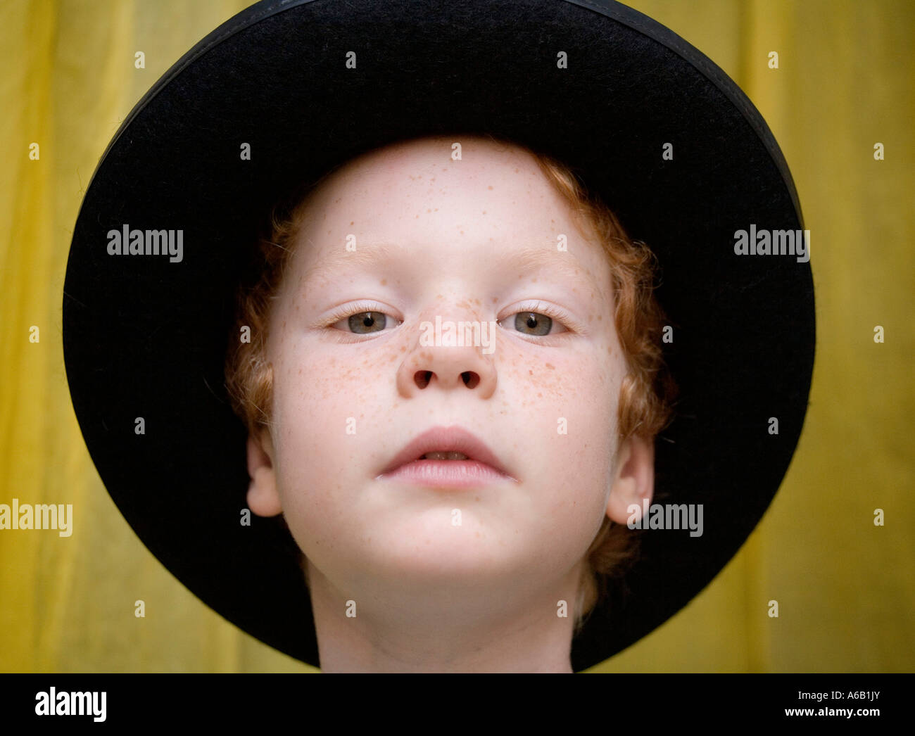 Portrait of young boy with hat Stock Photo - Alamy