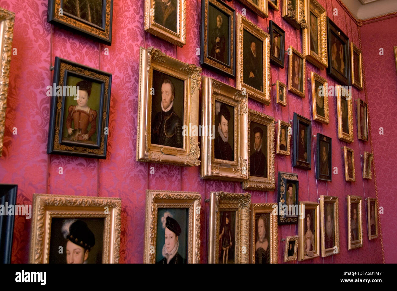 Room with many portraits of members of royal family Chateau of ...
