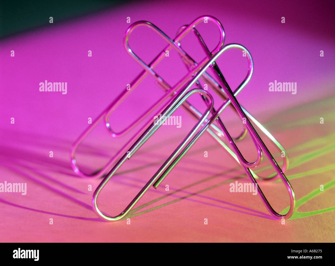 Paper clips interconnected as concept image eg lending support giving ...