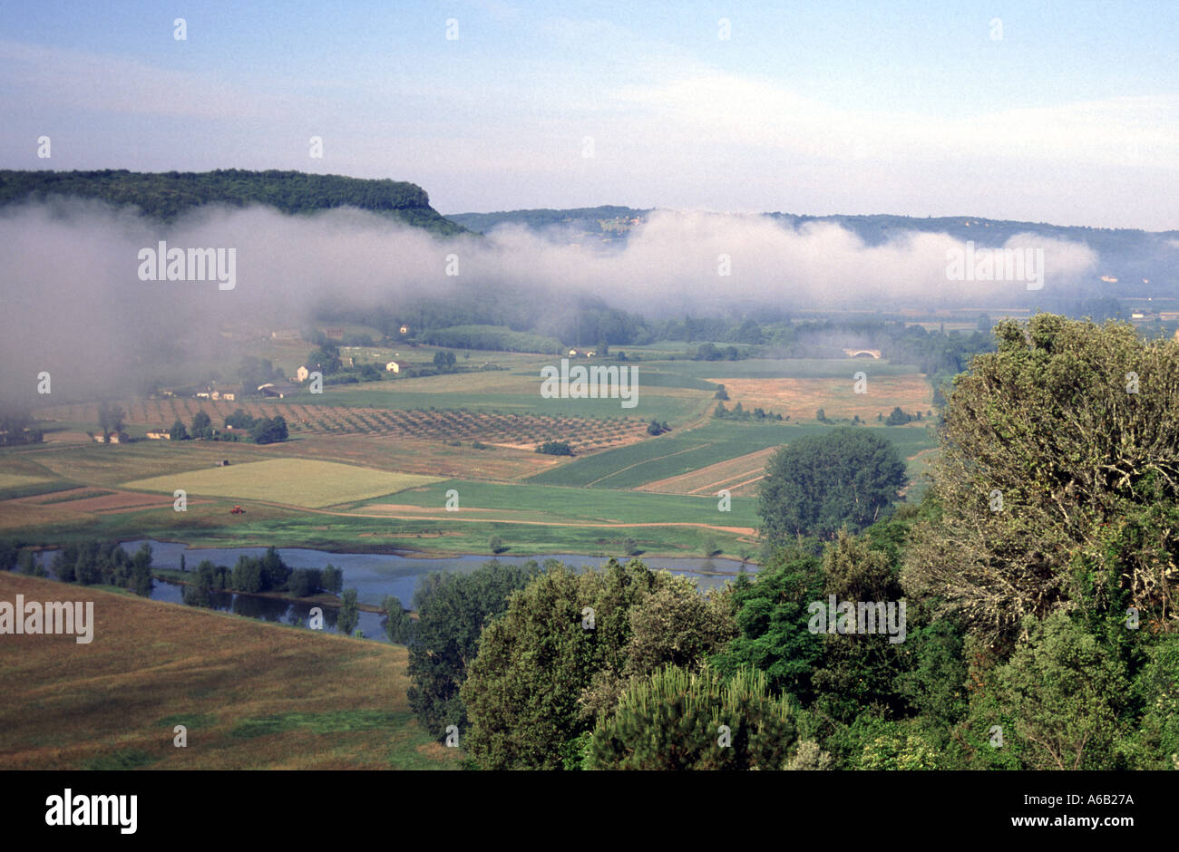 Clouds of low level mist over farming landscape above River Dordogne ...