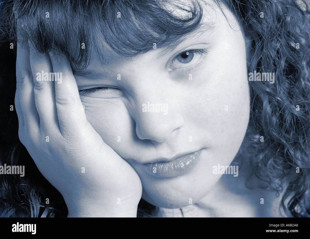 Bored teenage girl leaning on hand Stock Photo - Alamy Bored teenage girl leaning on hand Stock Photo - Alamy