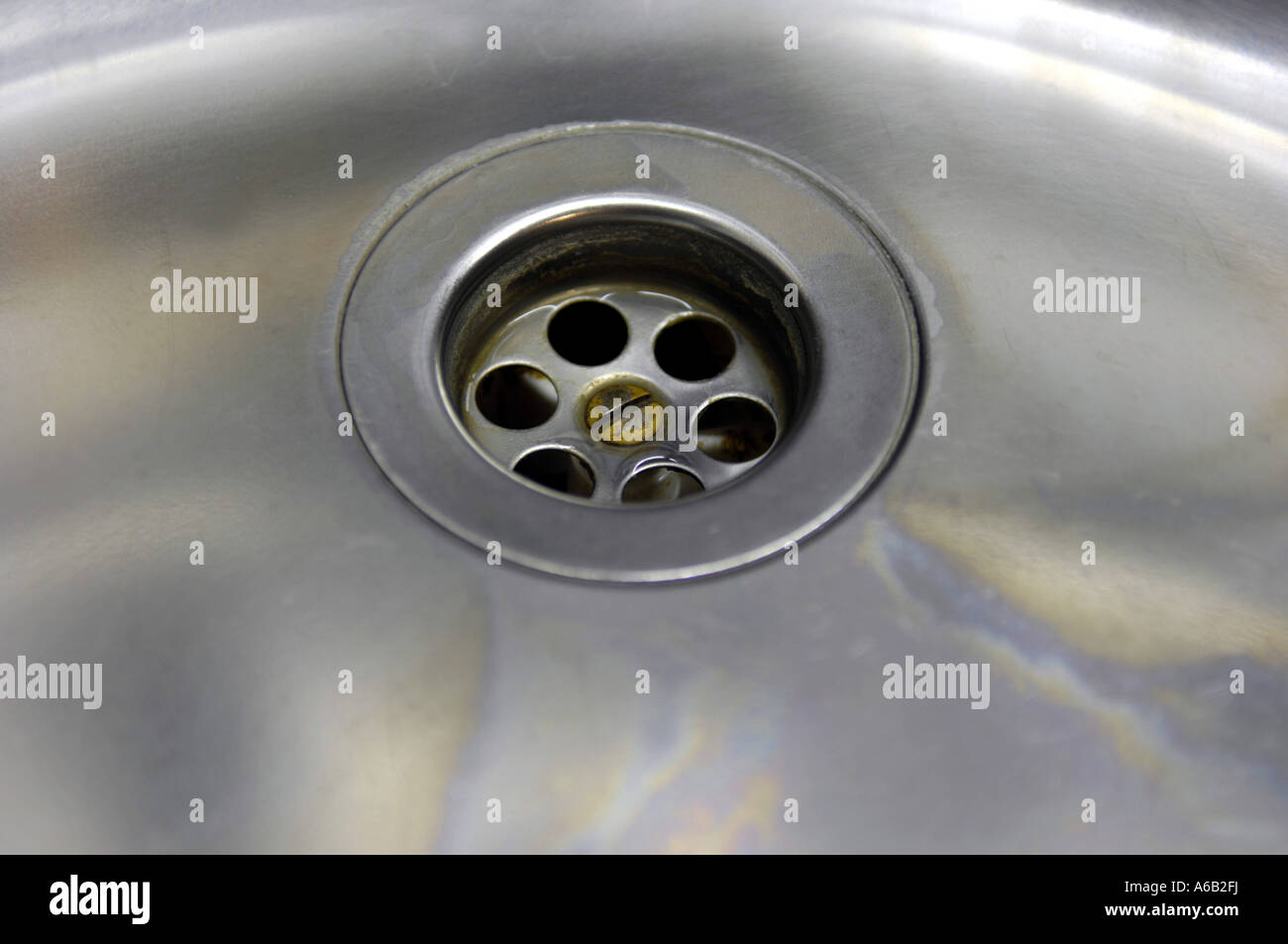 plughole silver metal metallic sink down the drain negative concept ...