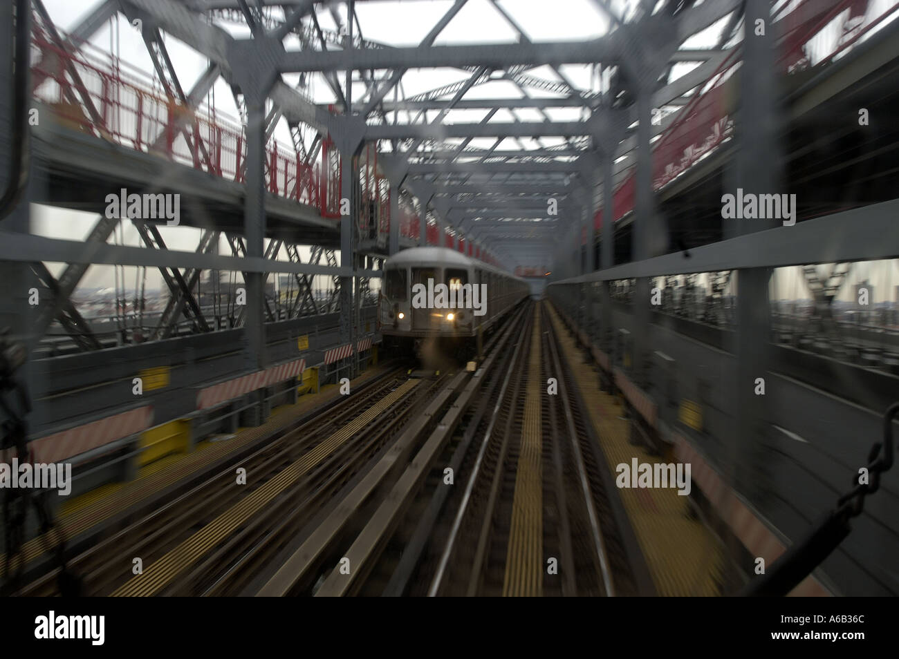 Williamsburg Subway bridge grid metal pillars commuters train station ...