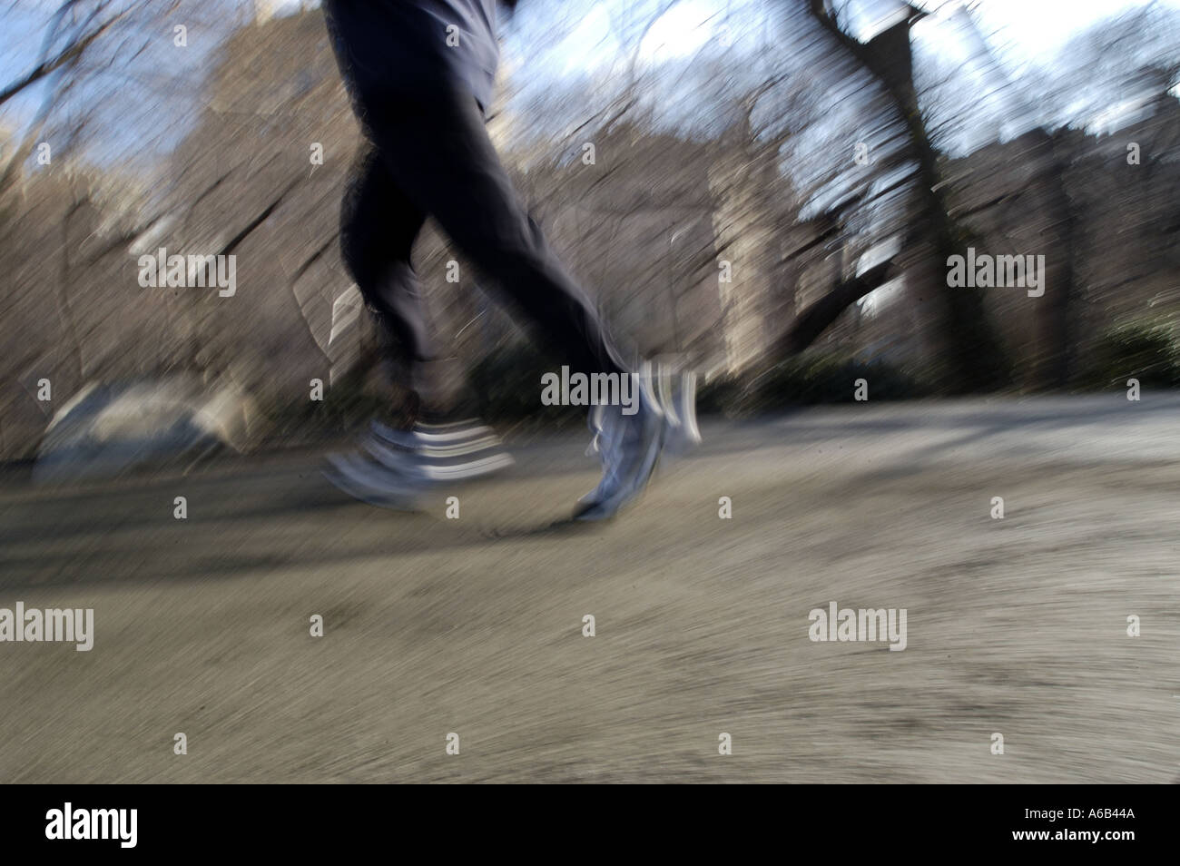Jogger running alongside the Central Park Reservoir Stock Photo - Alamy