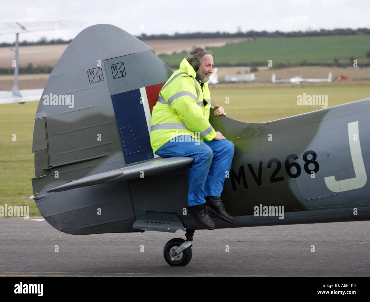 Spitfire man sitting on tail hi-res stock photography and images - Alamy