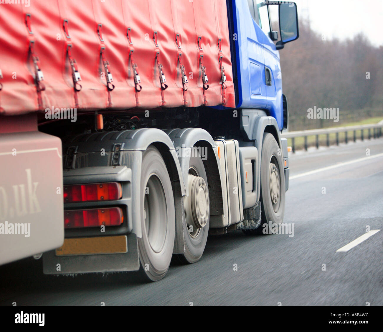 Large delivery goods lorry travelling on motorway Stock Photo - Alamy