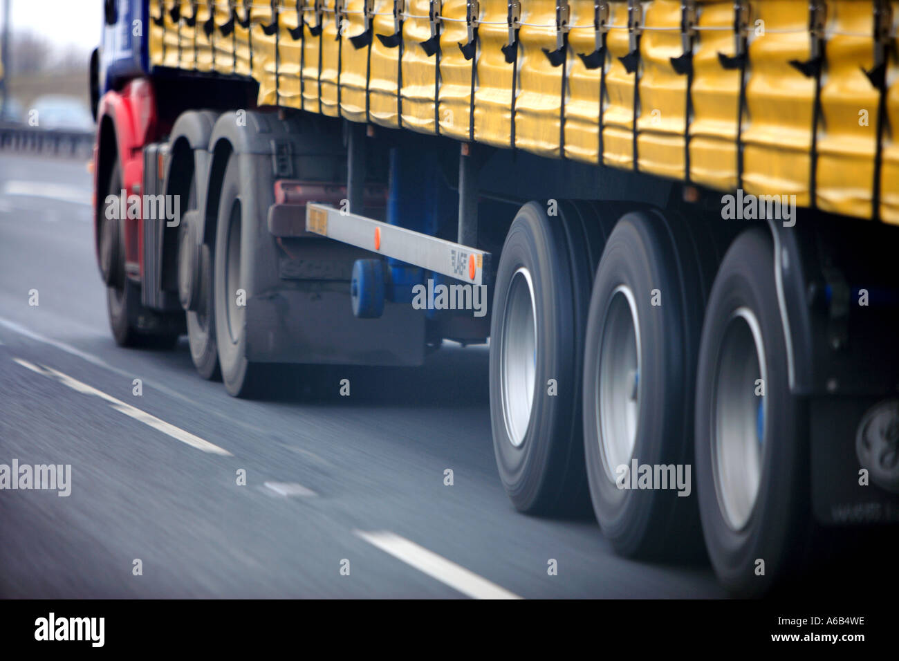 Large delivery goods lorry travelling on motorway Stock Photo - Alamy