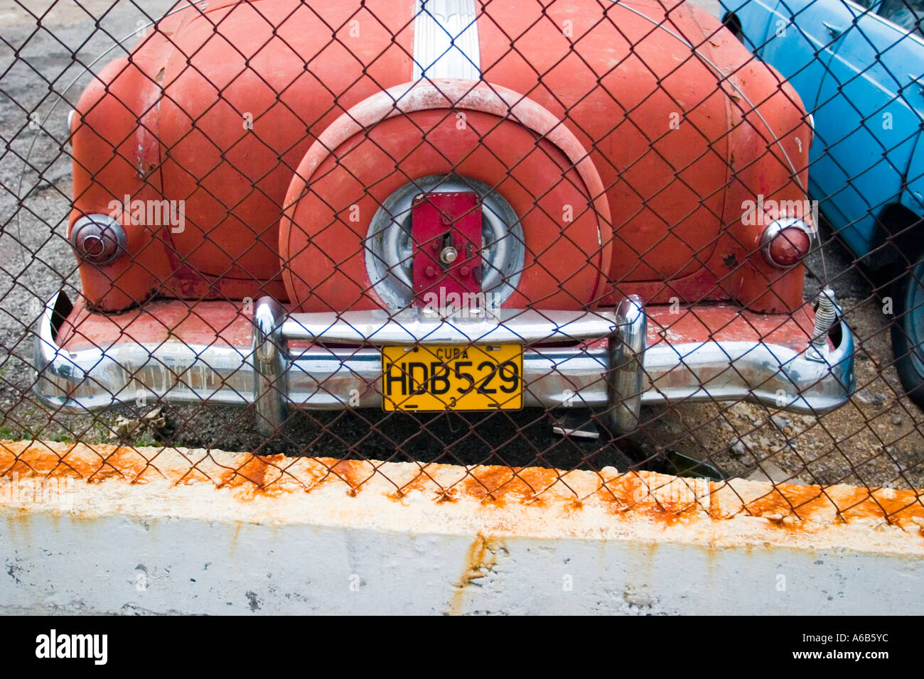Classic American automobile in fenced compound, Havana Stock Photo - Alamy