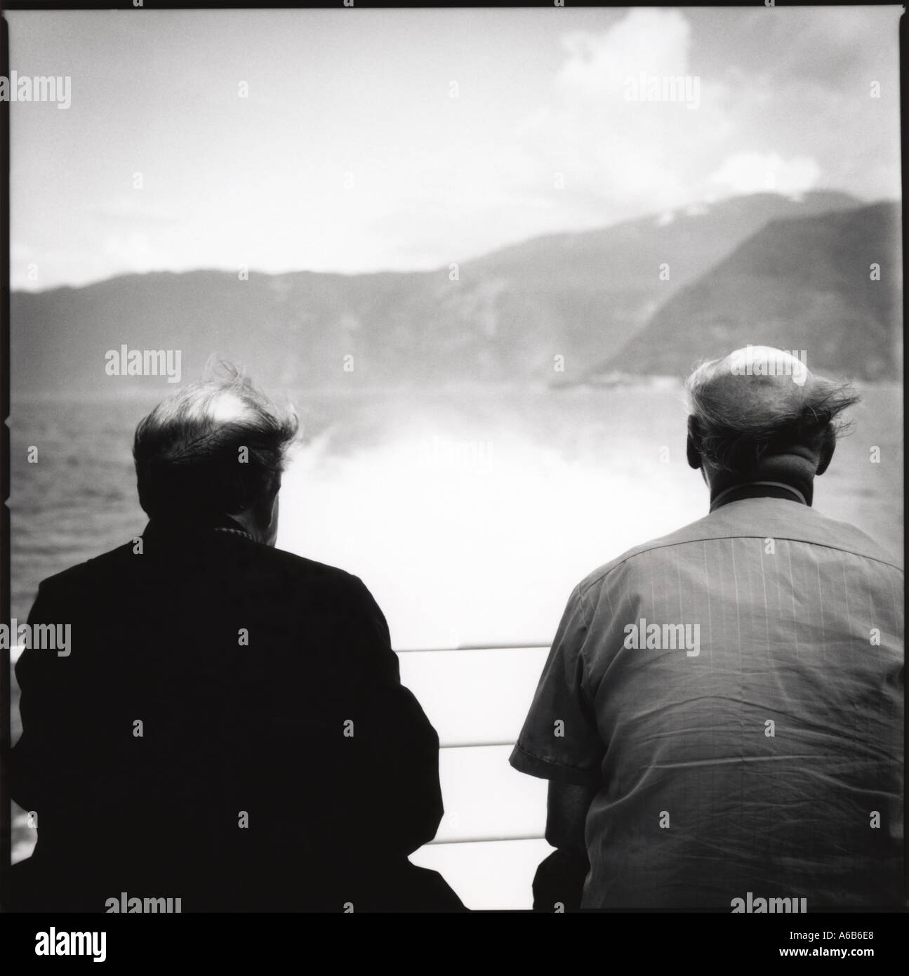 portrait of two men on a boat Stock Photo - Alamy