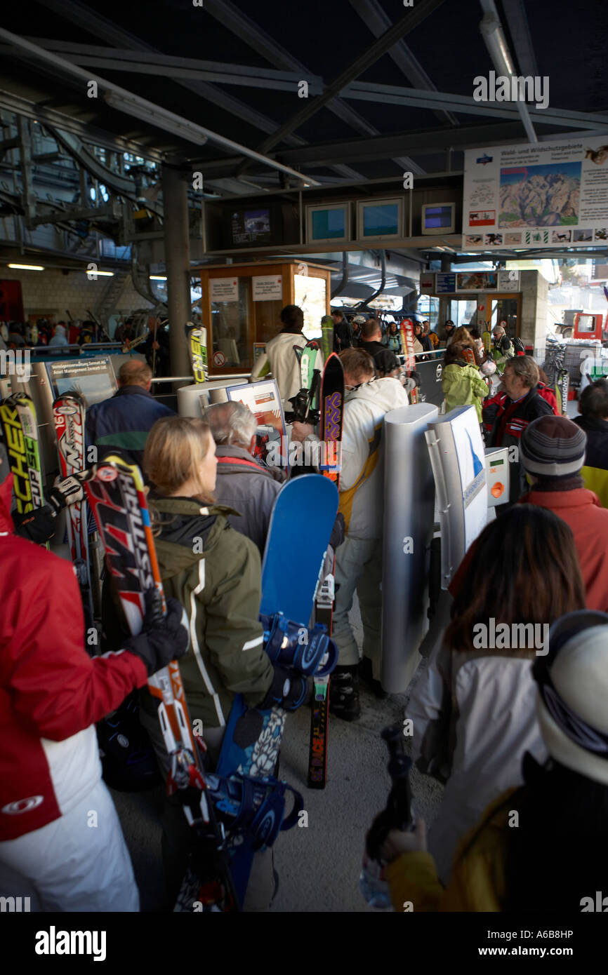 Skiers queueing for the ski lifts in Zermatt Switzerland Europe ...
