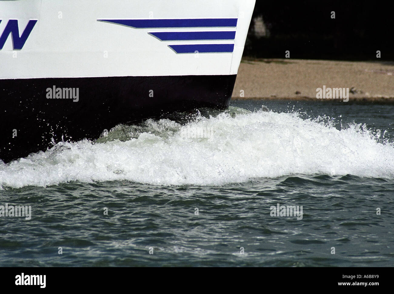 Bow wave forming in water in front of boat Stock Photo - Alamy