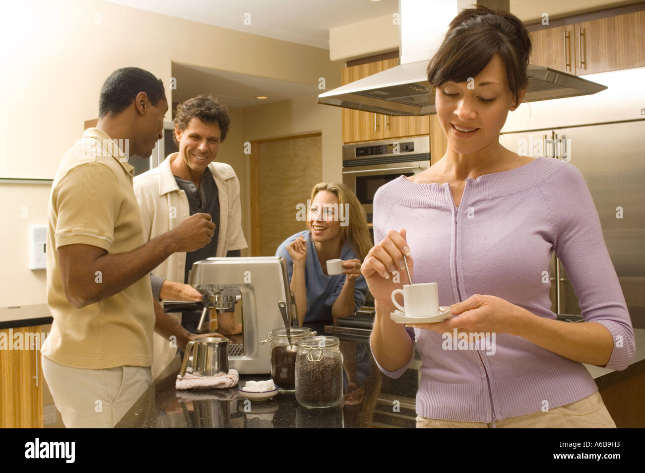 Group of adults drinking coffee Stock Photo - Alamy