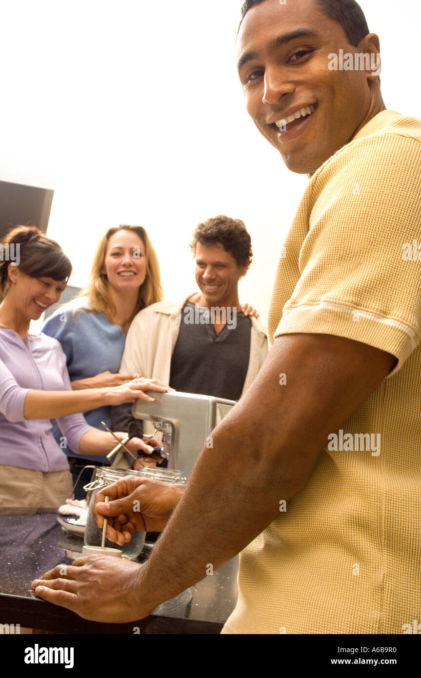 Group of adults drinking coffee Stock Photo - Alamy