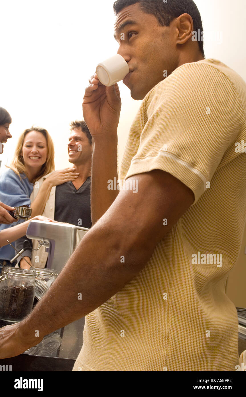 Group of adults drinking coffee Stock Photo - Alamy