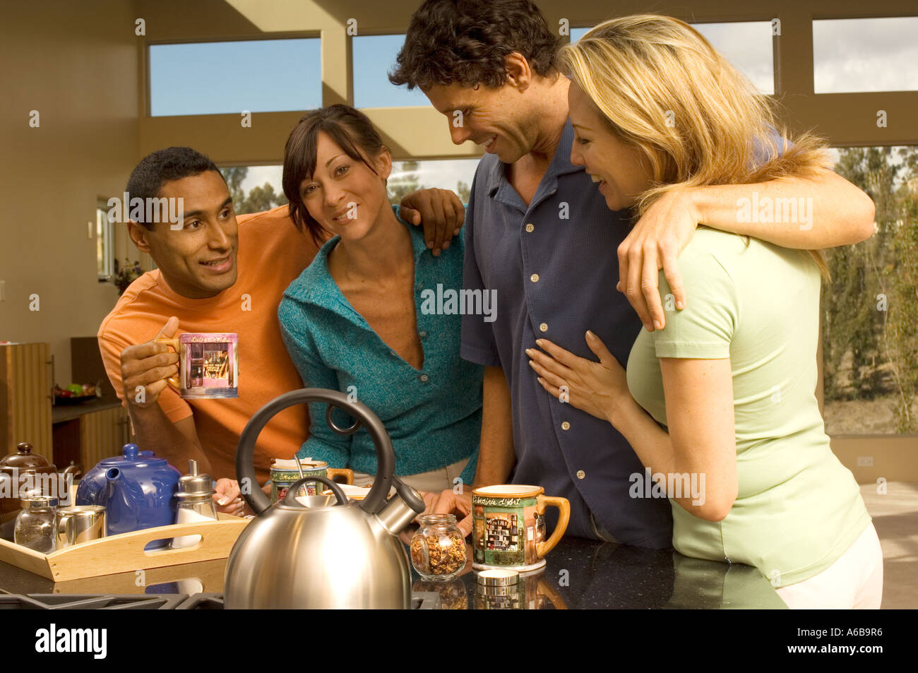 Group of adults drinking coffee Stock Photo - Alamy
