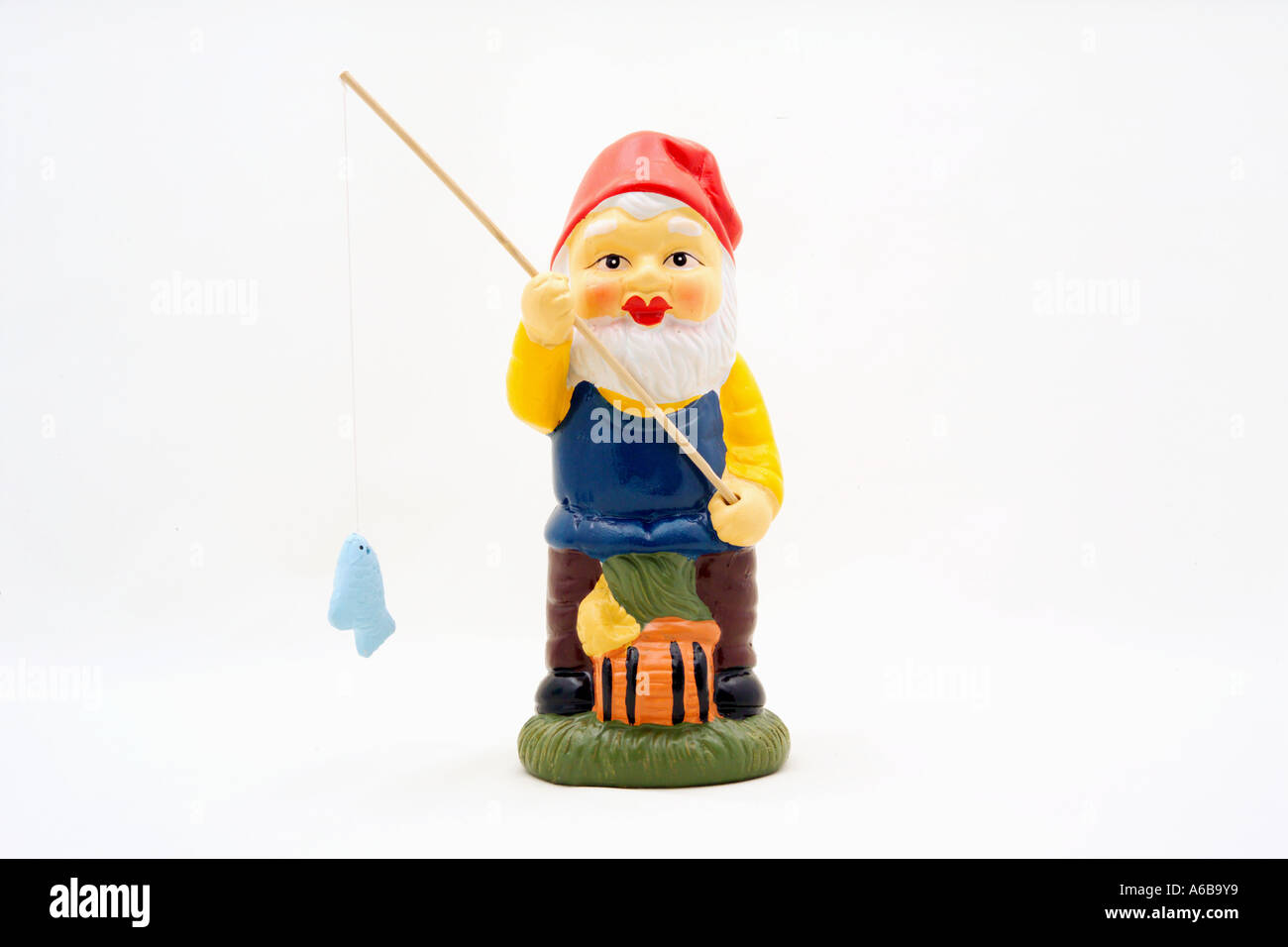 Garden Gnome with Fishing rod on white background Stock Photo - Alamy