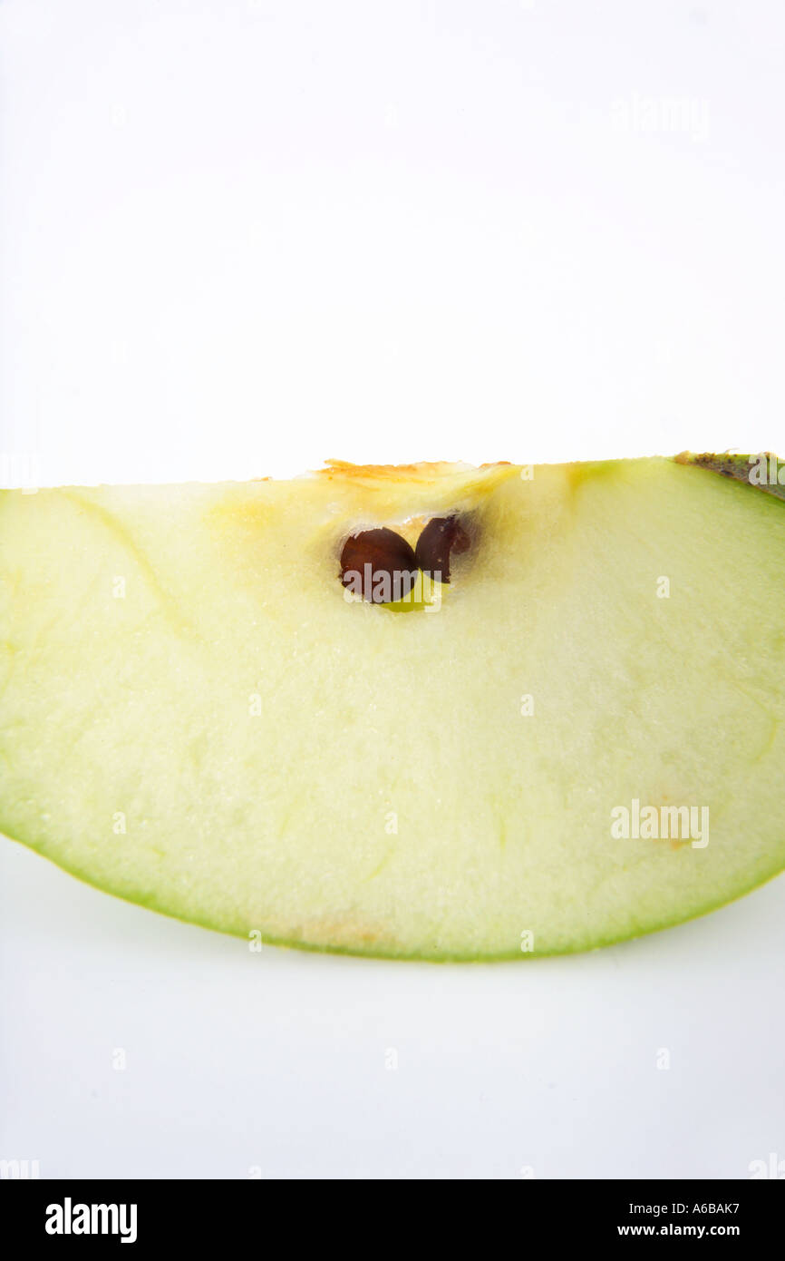 slice of a granny smith apple Stock Photo - Alamy