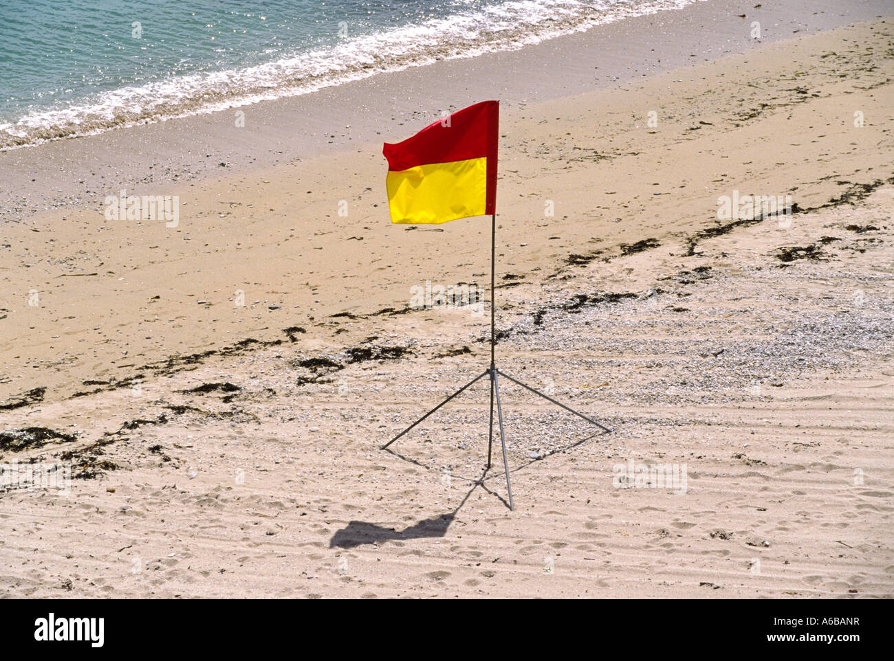 red and yellow flag signifying that swimming boogie boarding and ...