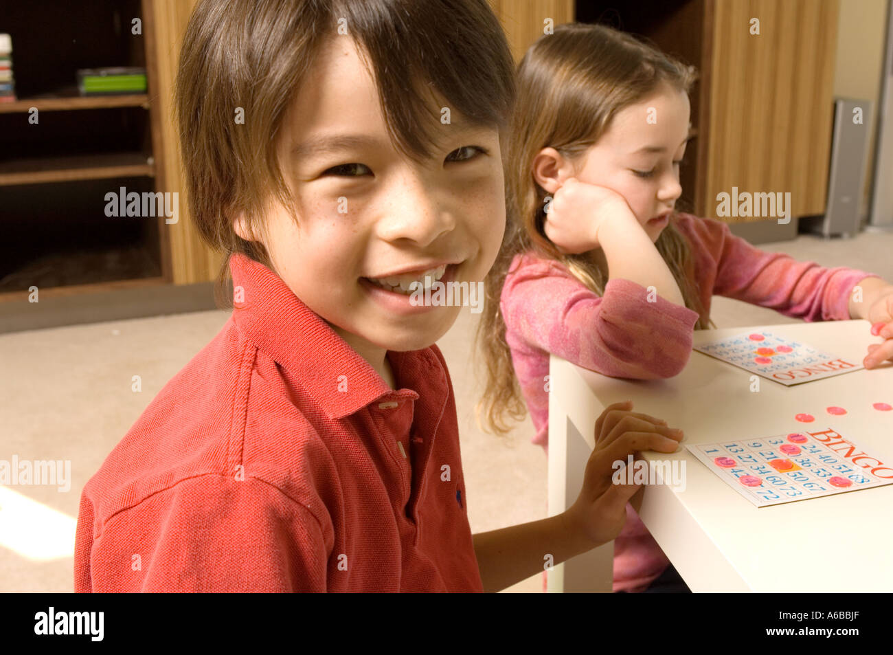 Portrait of kids playing games Stock Photo - Alamy