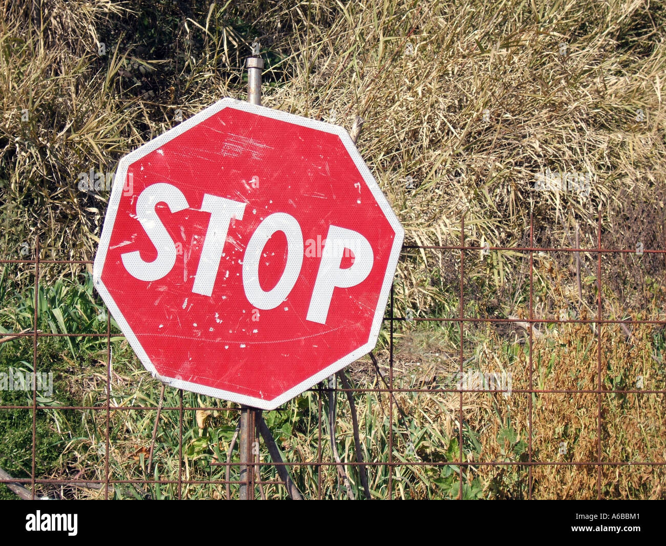 old stop sign in countryside Stock Photo - Alamy