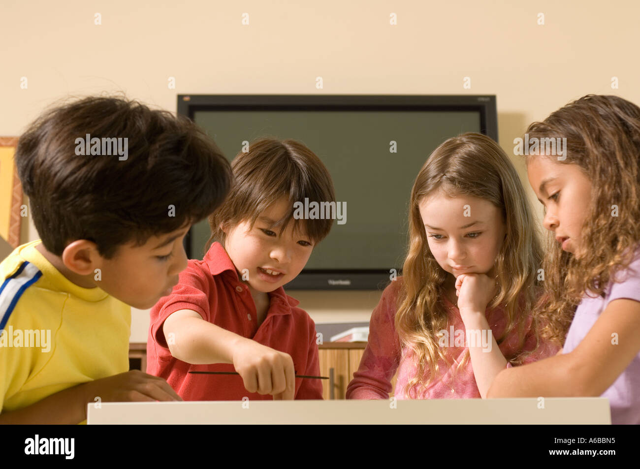 Portrait of kids playing games Stock Photo - Alamy