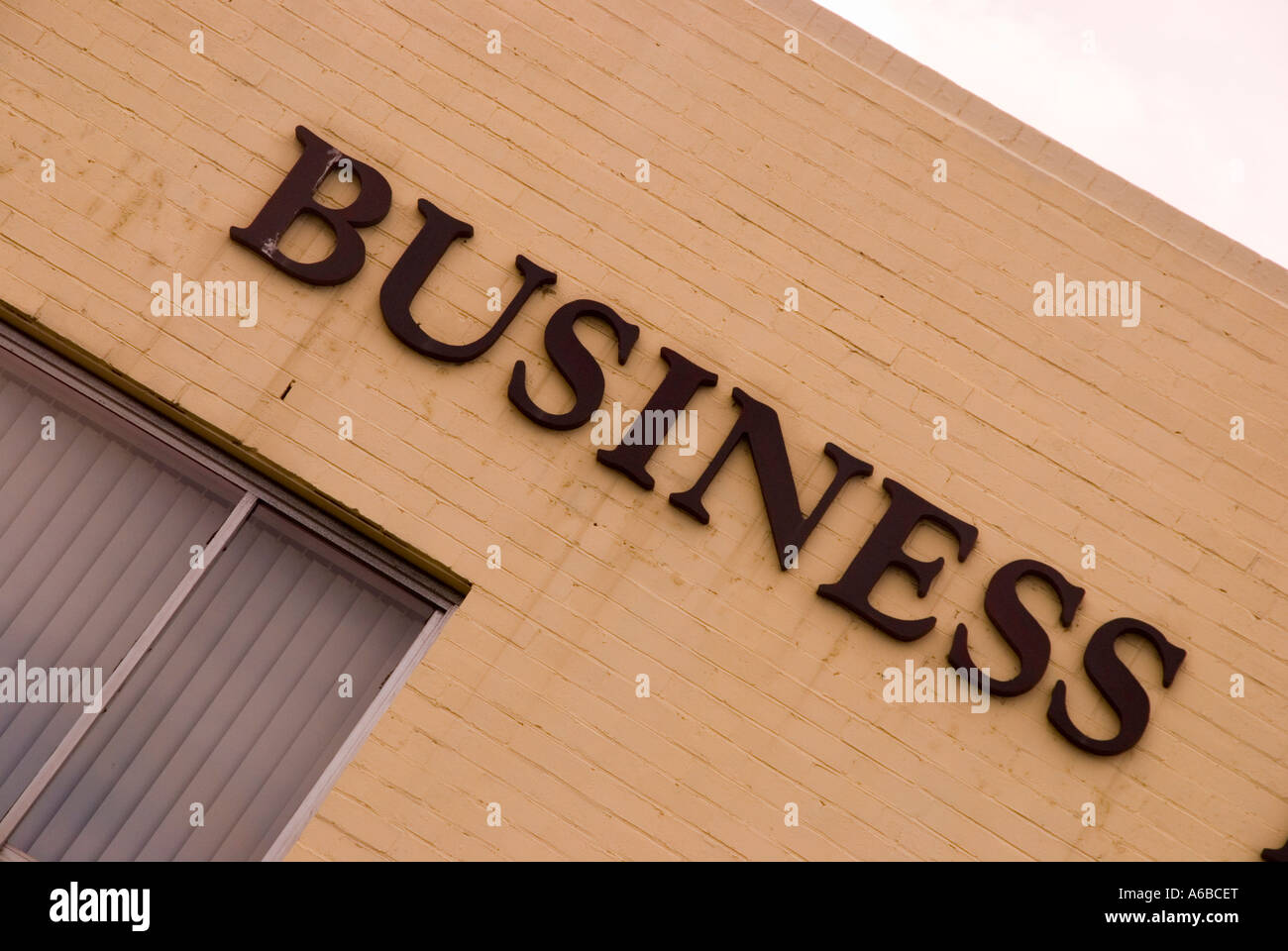 Sign on building reading Business Stock Photo - Alamy