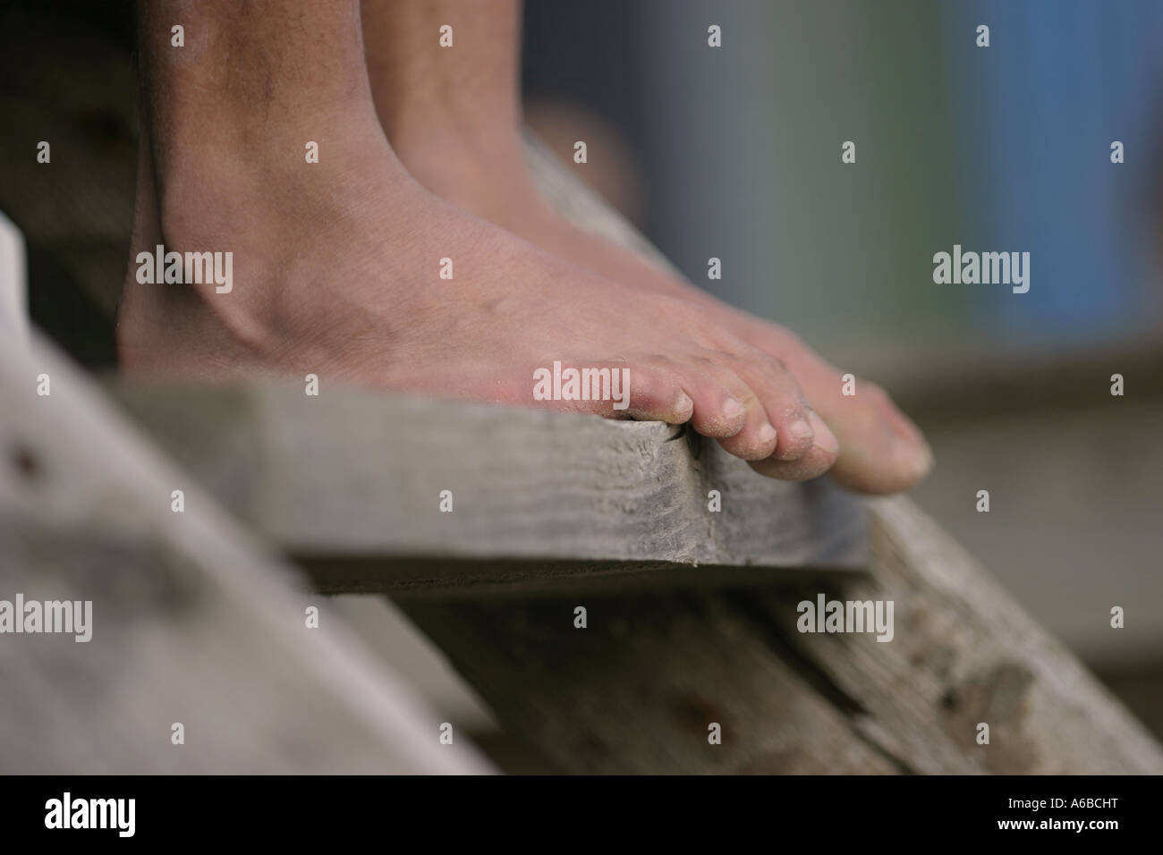 Barefoot on a step Stock Photo - Alamy