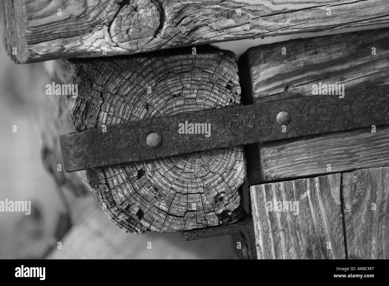 Boardwalk detail rusting bracket Stock Photo - Alamy