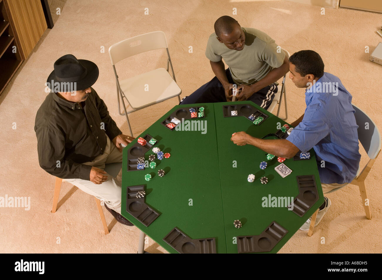 Portrait of men playing cards Stock Photo - Alamy