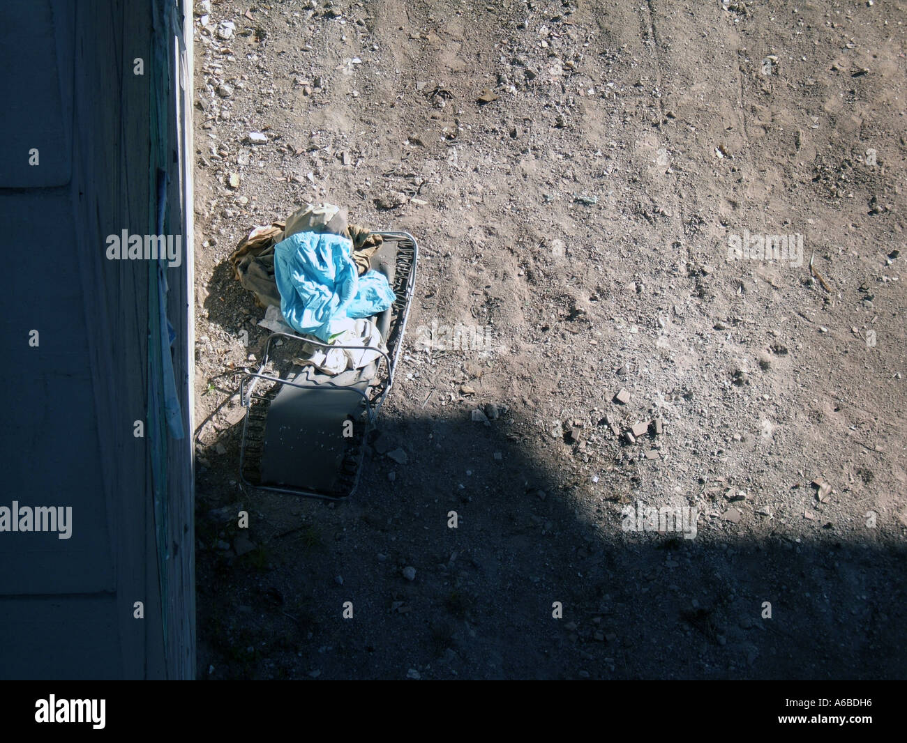 bed of homeless person under bridge Stock Photo - Alamy