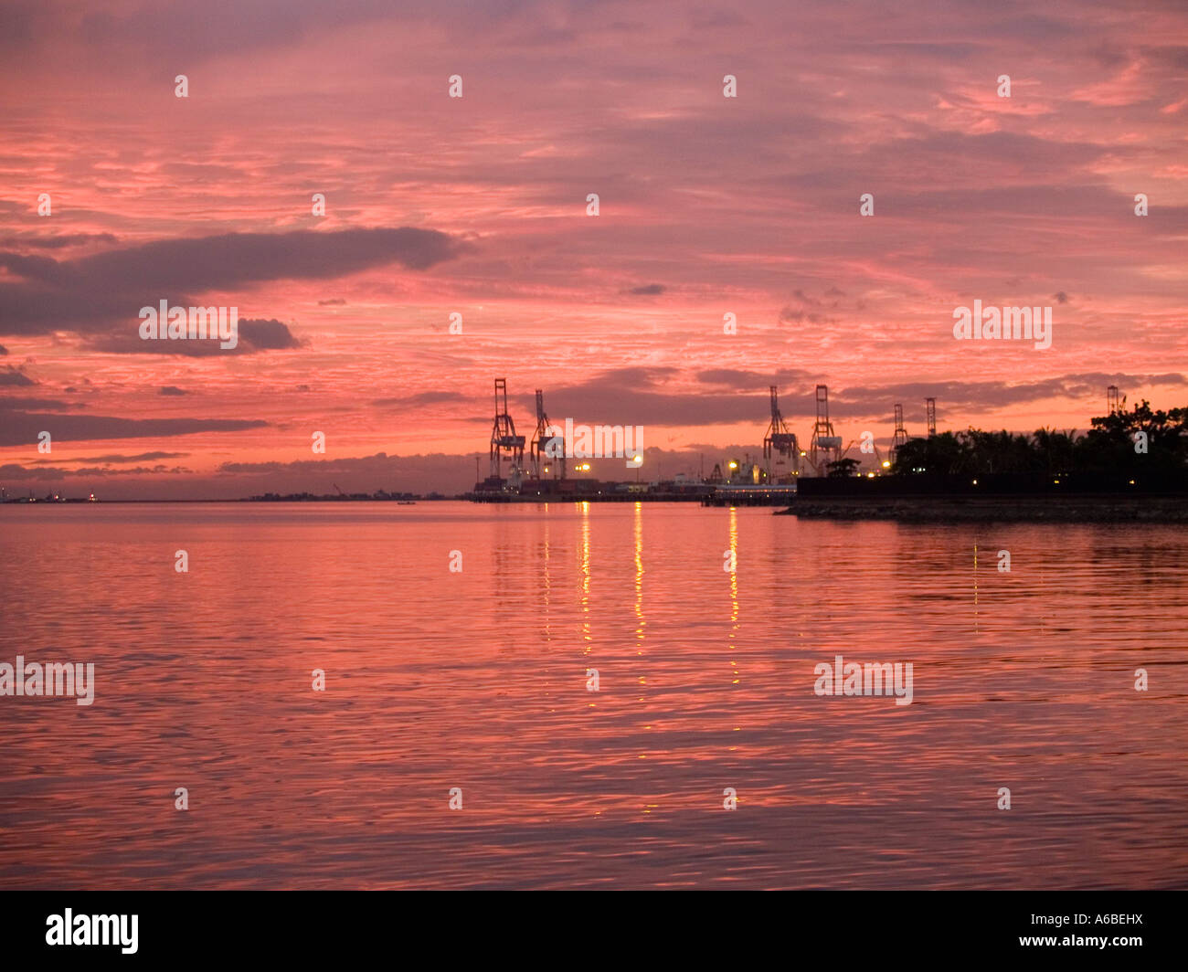 brilliant sunset over the Manila harbor Philippines Stock Photo - Alamy