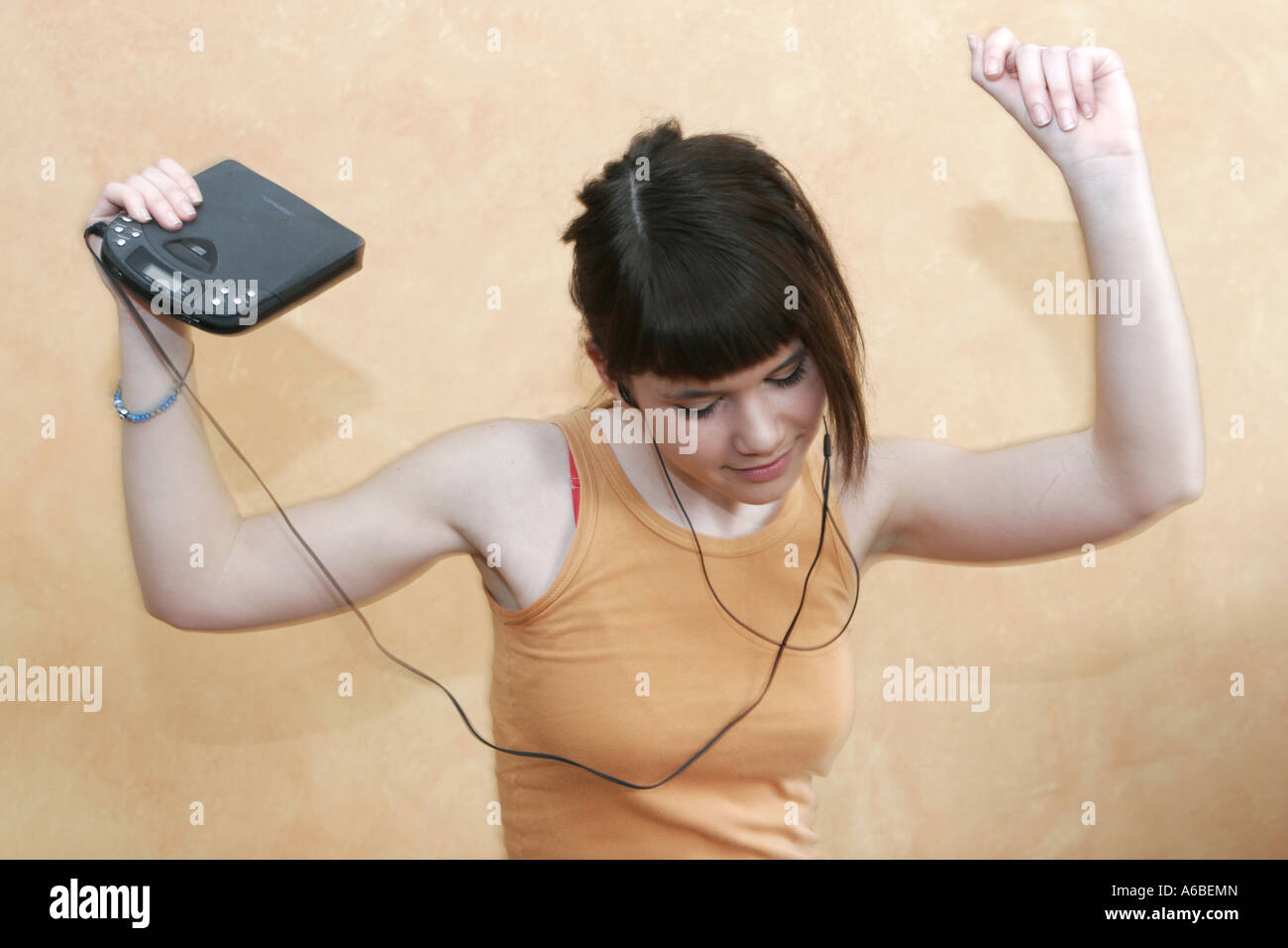 teenage girl dancing to music Stock Photo - Alamy