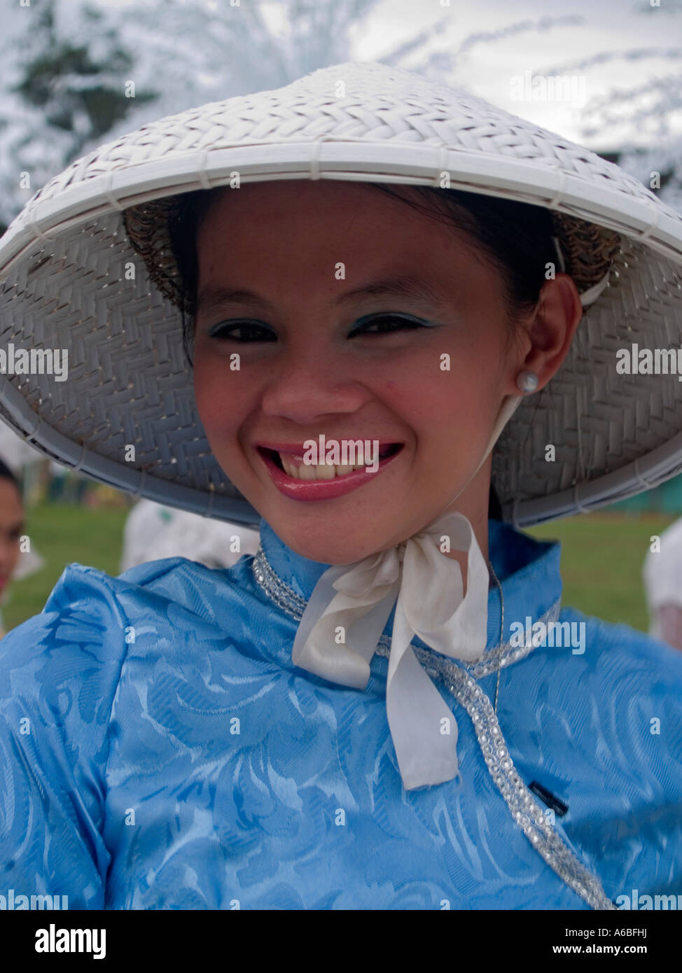 big smile white hat participant at the Sinulog Festival major event of ...