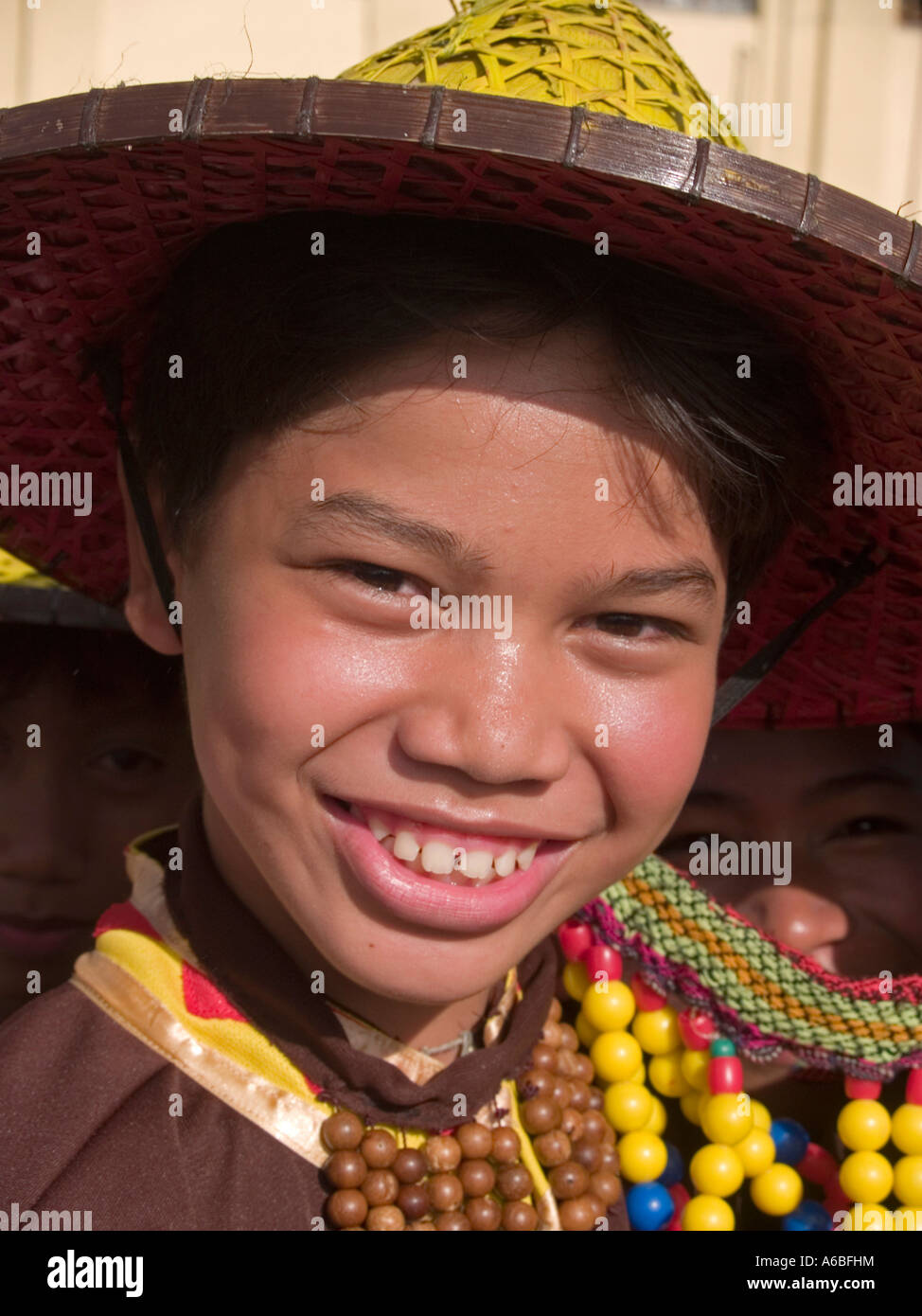 boy with a bamboo hat and friends Cebu Philippines Stock Photo - Alamy