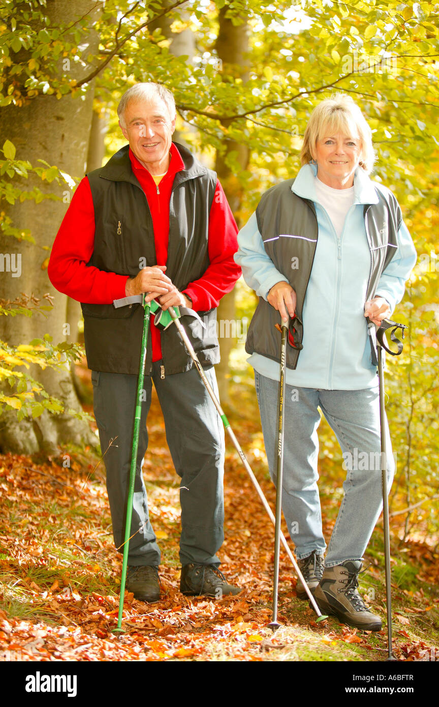 Senior couple doing nordic walking, Senioren Paar beim Nordic Walking ... Senior couple doing nordic walking, Senioren Paar beim Nordic Walking ...