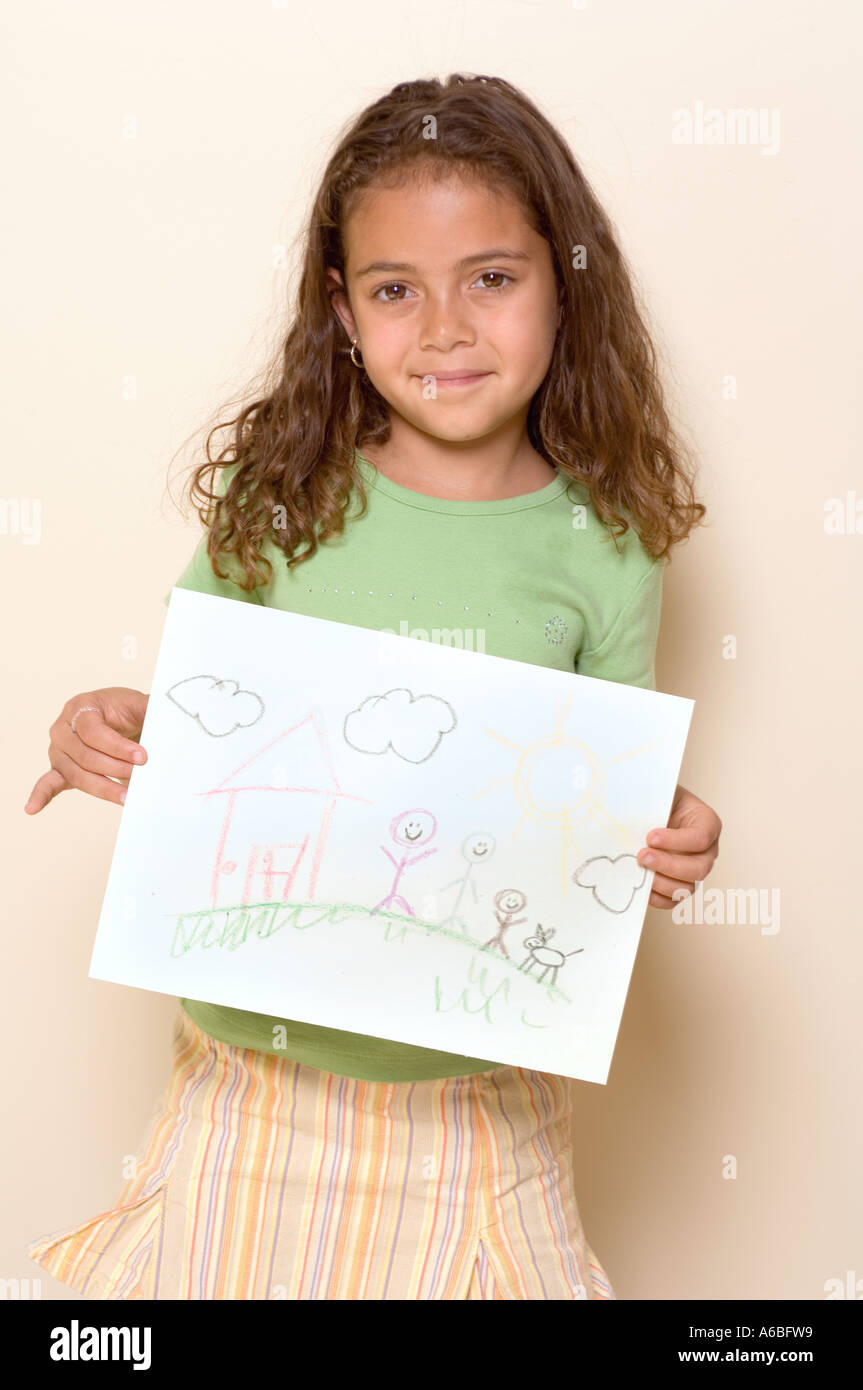 Portrait of Hispanic girl with drawing Stock Photo - Alamy