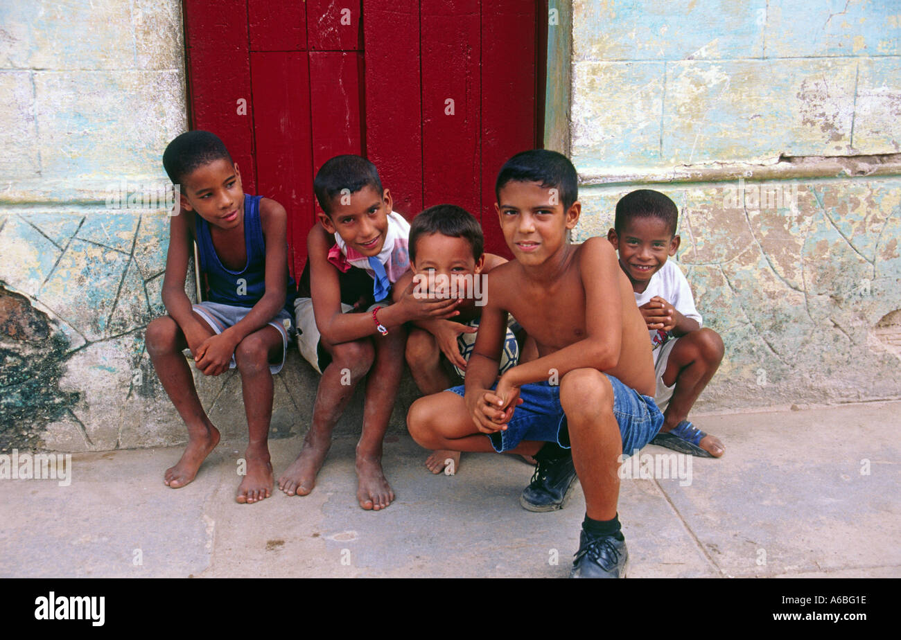 Group of five boys playing in the street in Trinidad Cuba Stock Photo ...