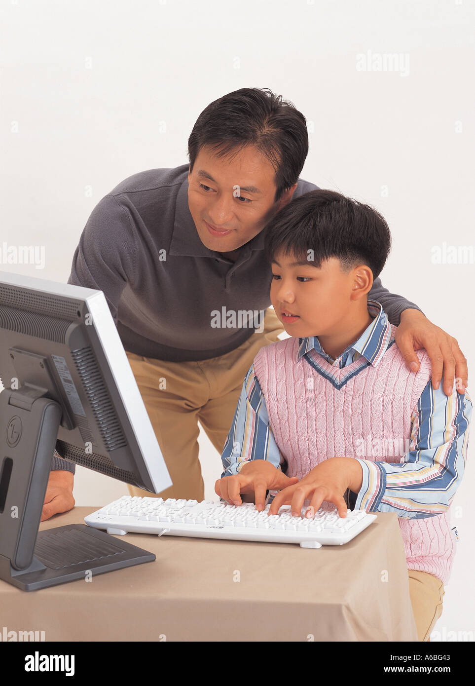 Boy watching at monitor hi-res stock photography and images - Alamy