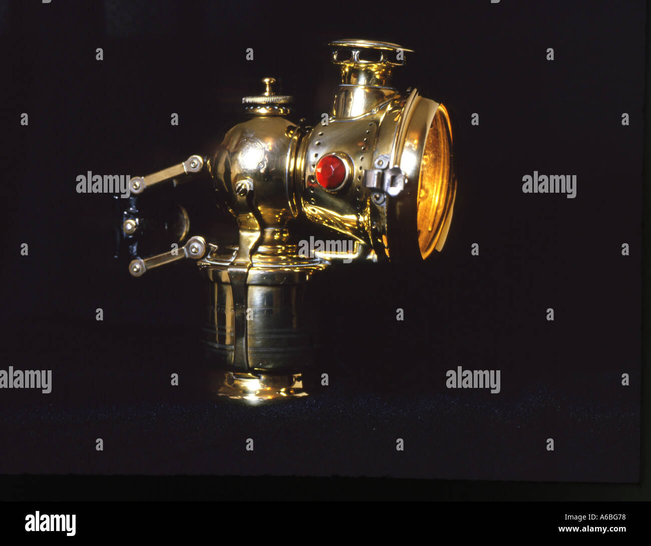 Old antique brass carbide lamp as used on motor vehicles and bicycles ...