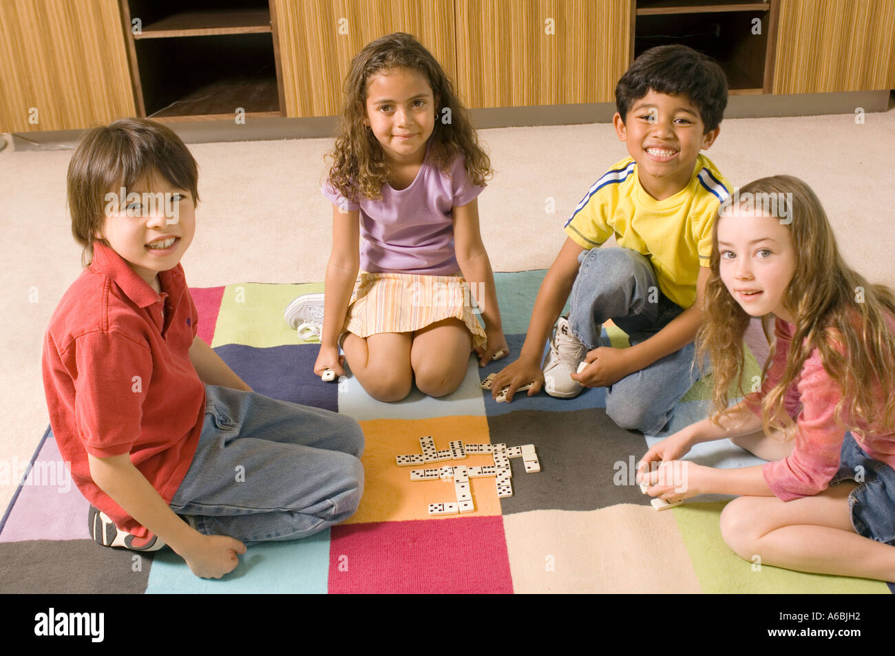 Portrait of kids playing games Stock Photo - Alamy