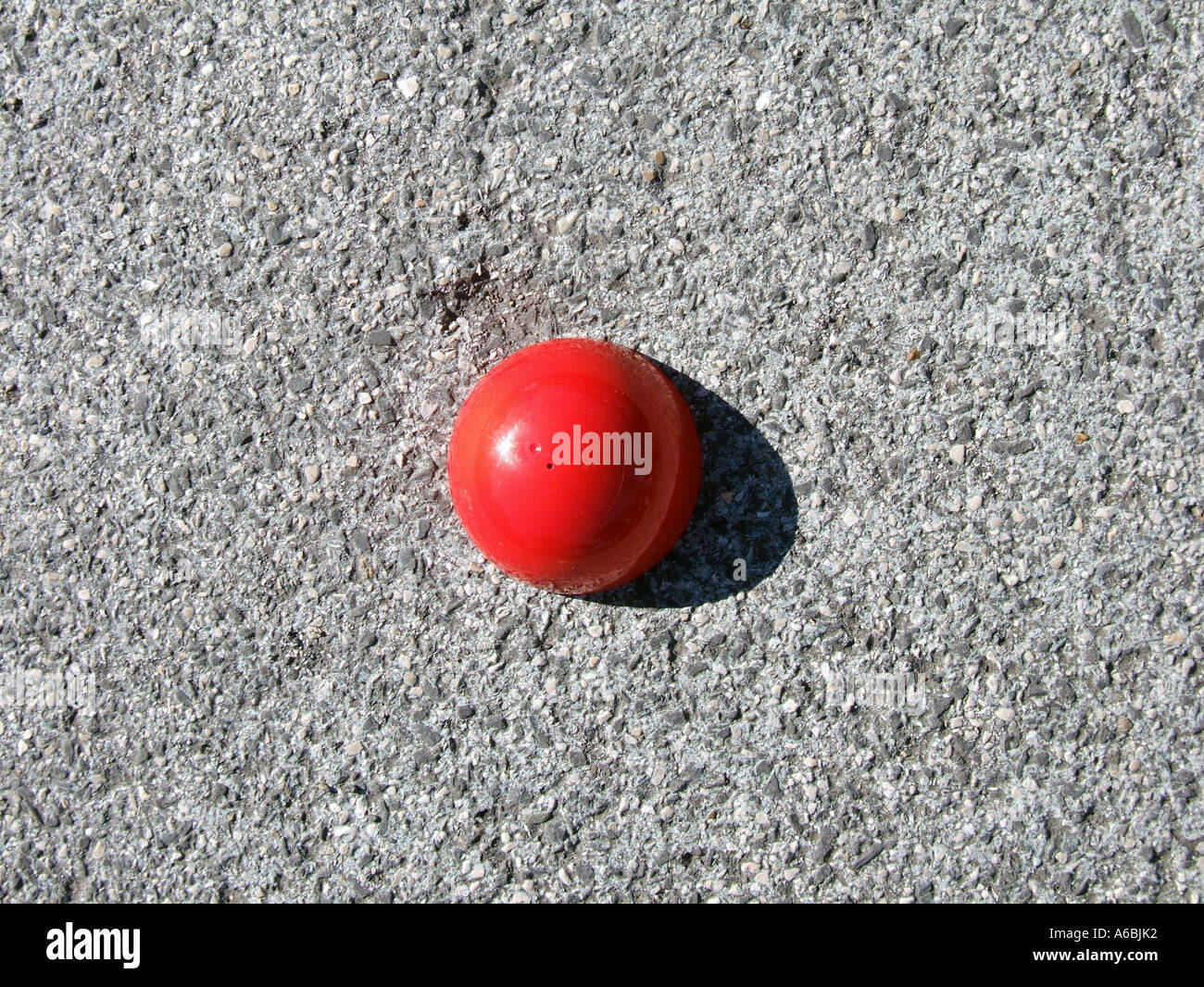 red skittle on road Stock Photo - Alamy